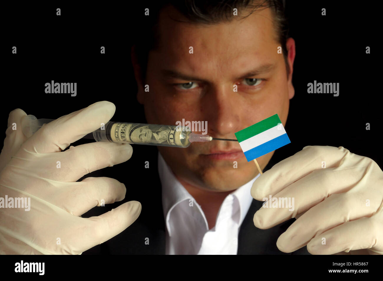 Young businessman gives a financial injection to Sierra Leone flag ...