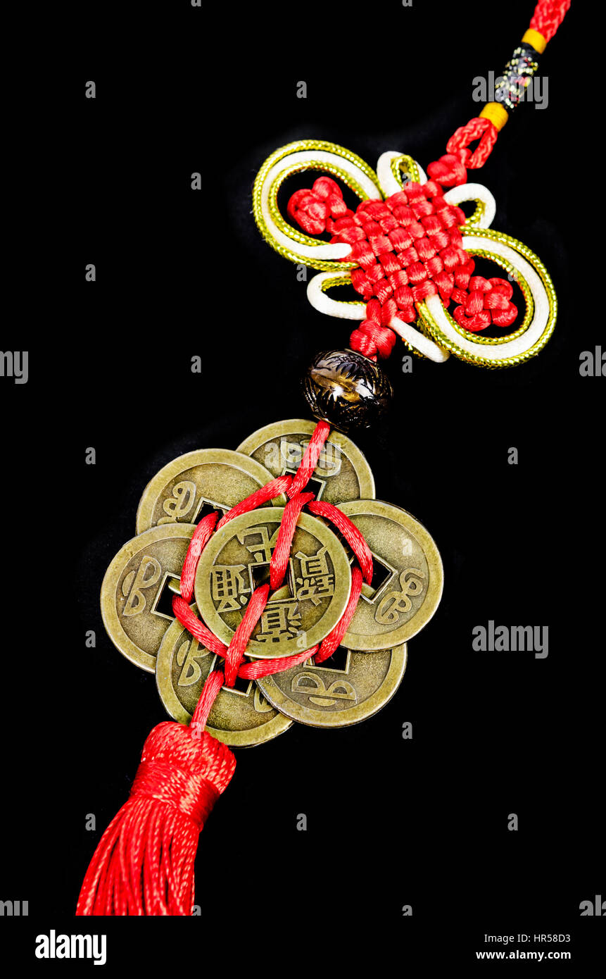 chinese coins of luck on black background Stock Photo - Alamy