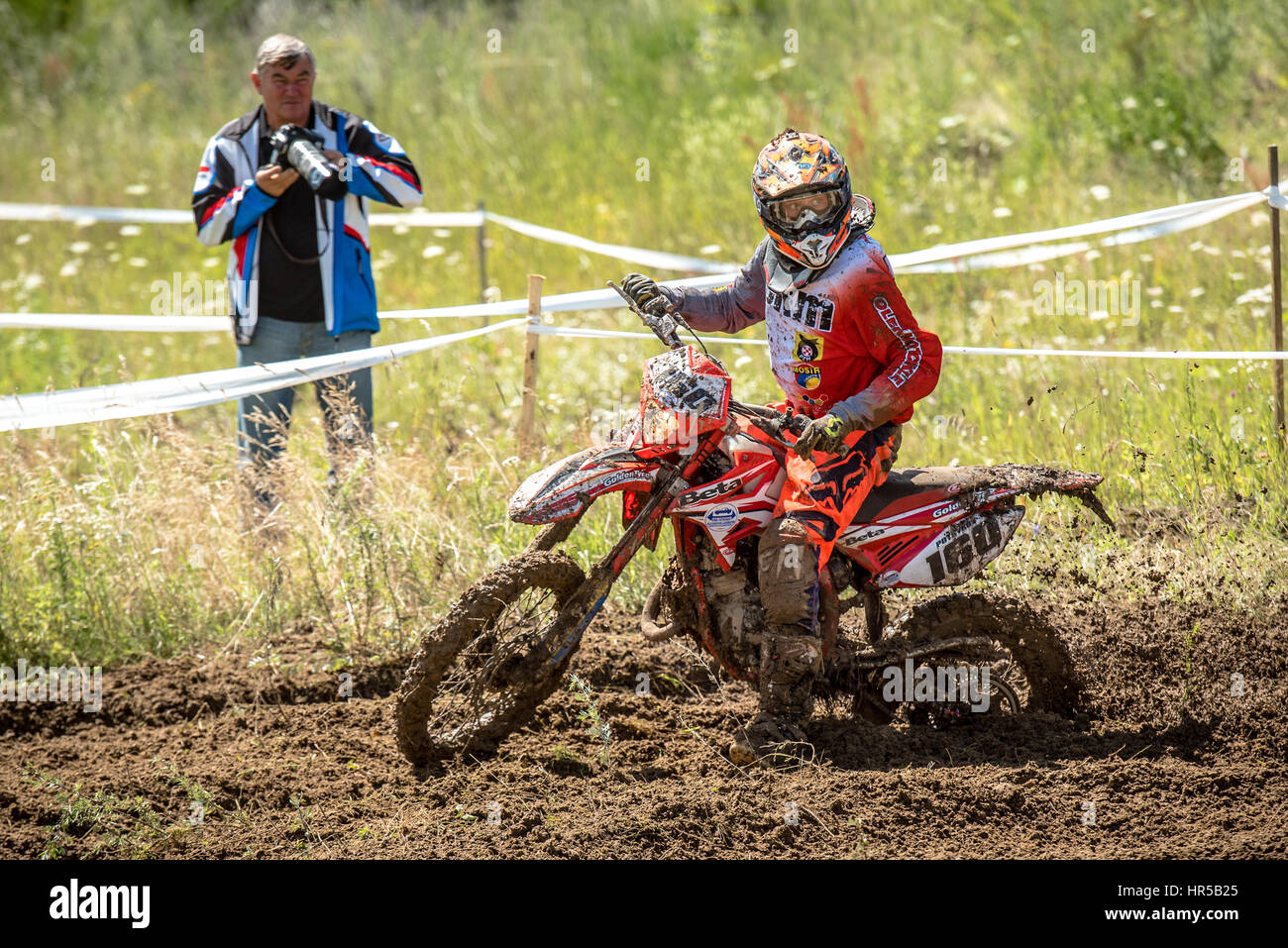 Motocross rider on the race Stock Photo - Alamy