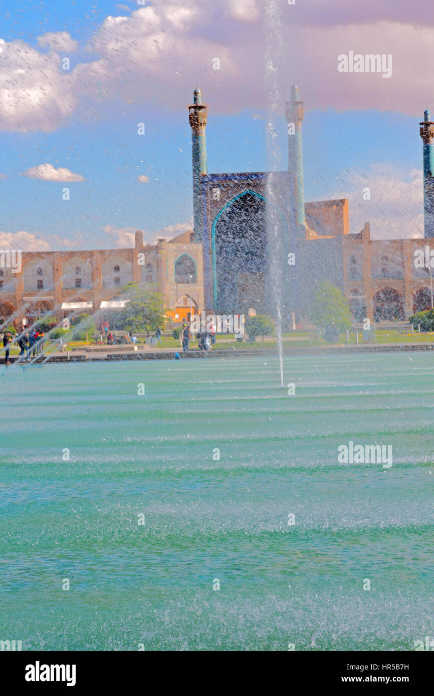 in iran old square mosque and fountain water backlight Stock Photo - Alamy