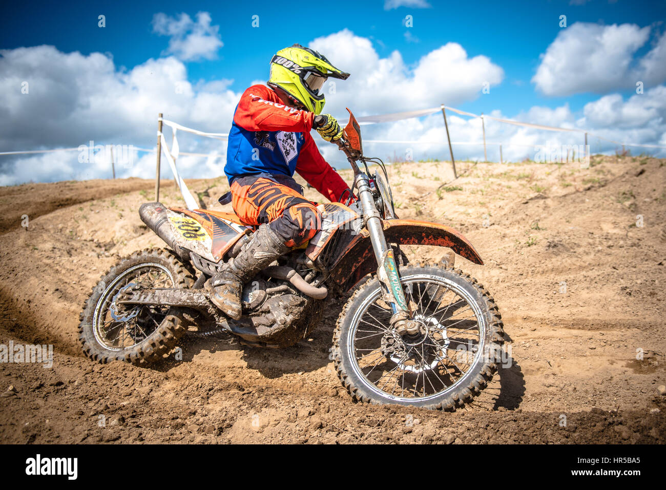Motocross rider on the race Stock Photo - Alamy