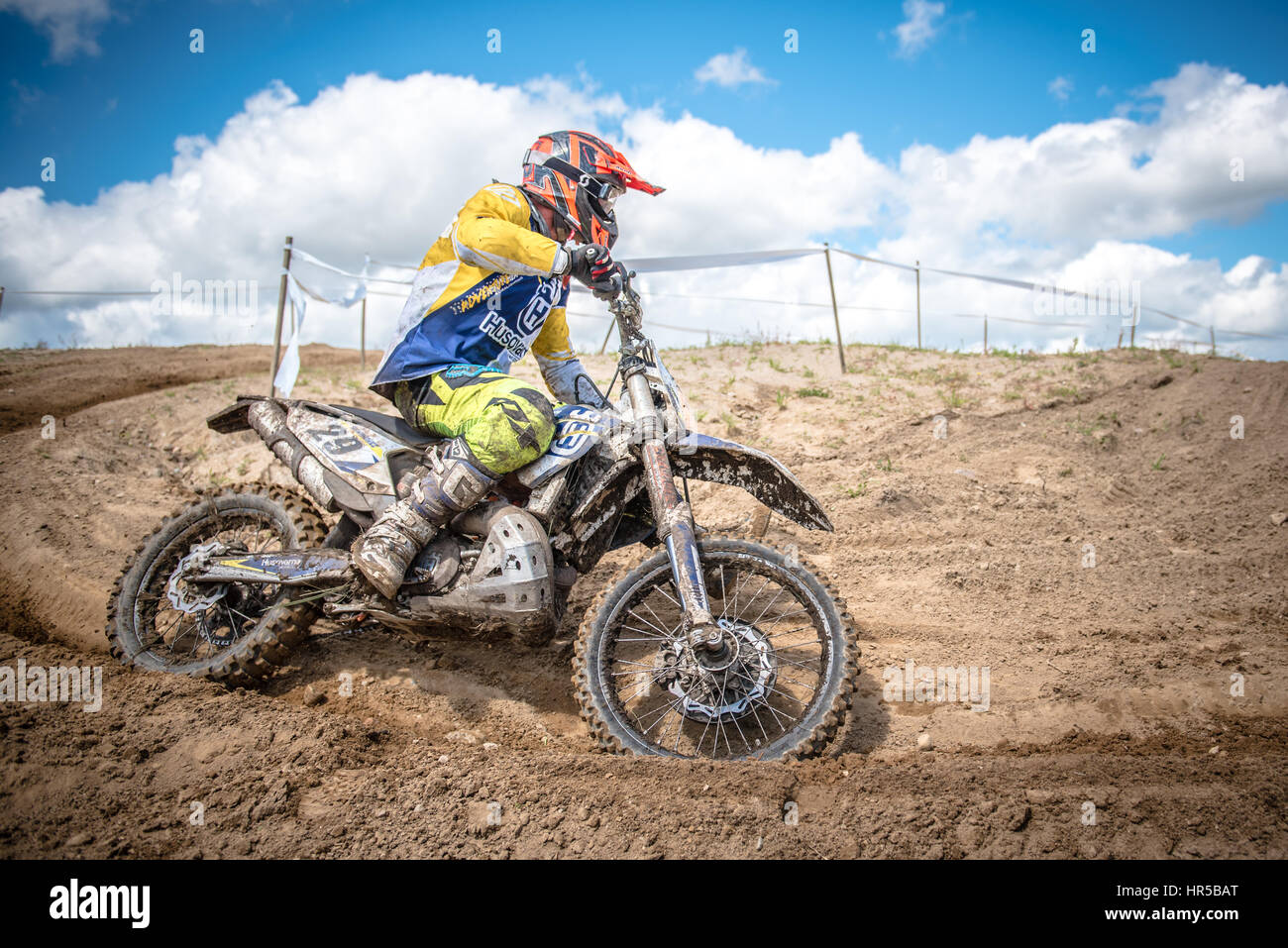 Motocross rider on the race Stock Photo - Alamy