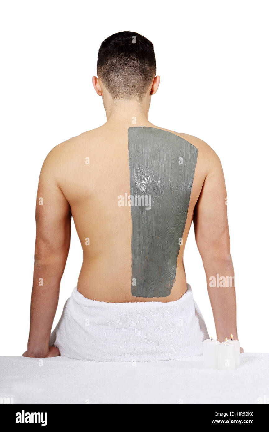 Mask of blue clay on the man's back Stock Photo - Alamy