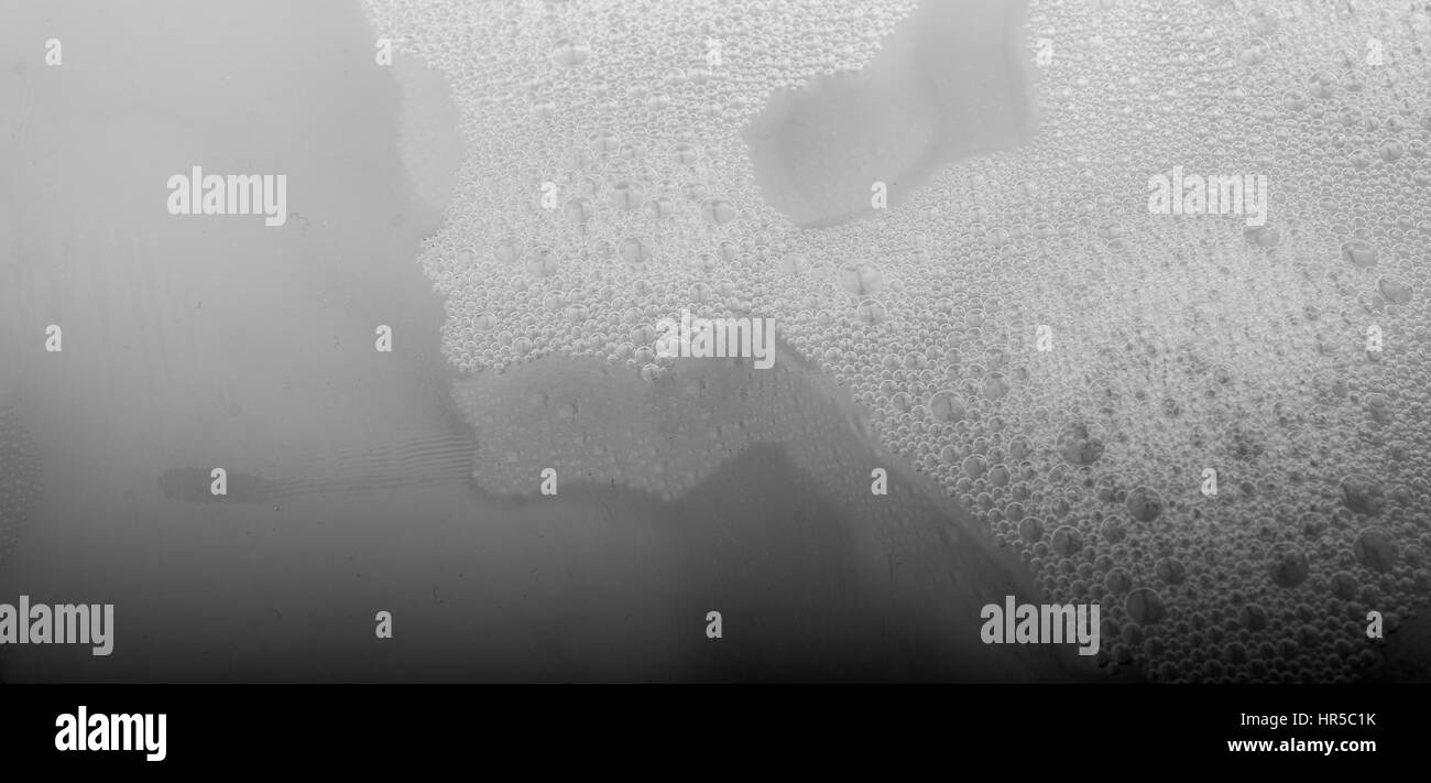 Pure water covered with foam of shampoo Stock Photo - Alamy