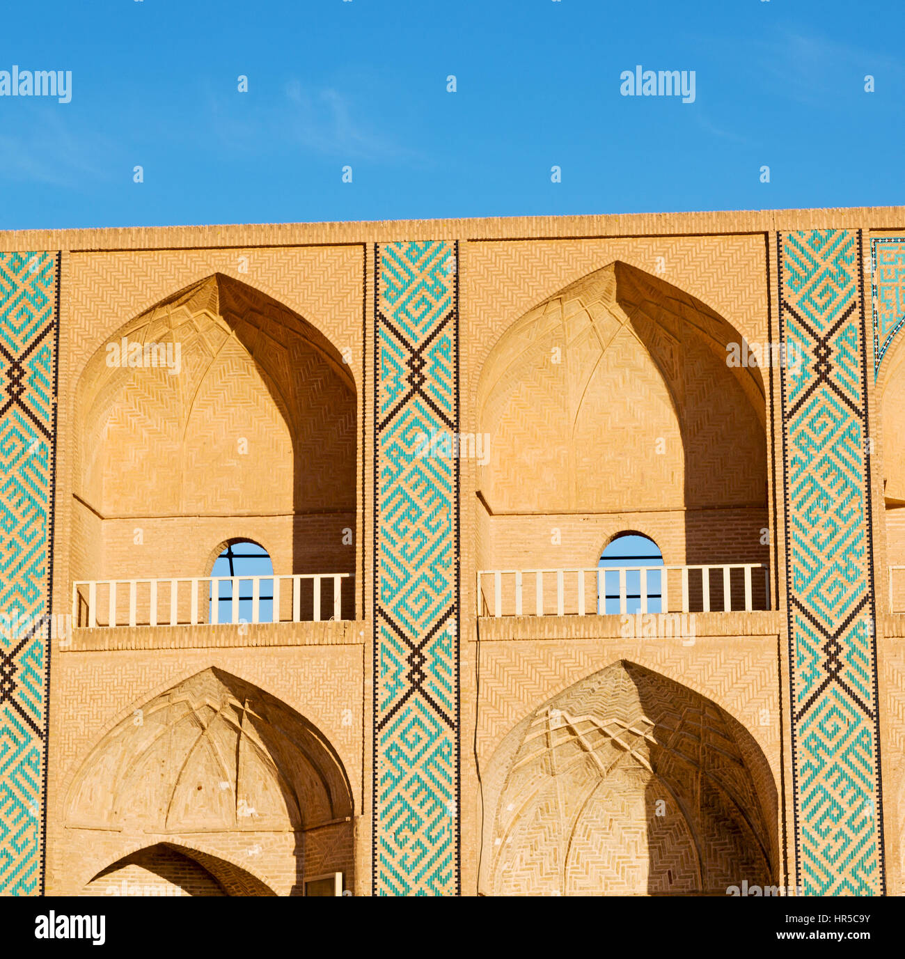 in iran the old mosque and traditional wall tile incision near minaret ...