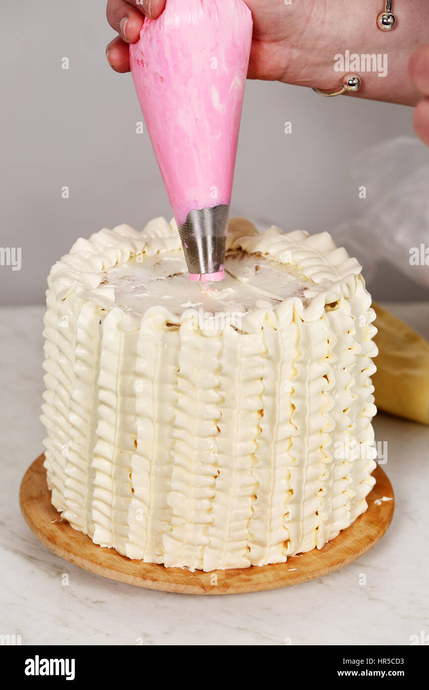 Beautiful female pastry chef decorating hi-res stock photography and ...