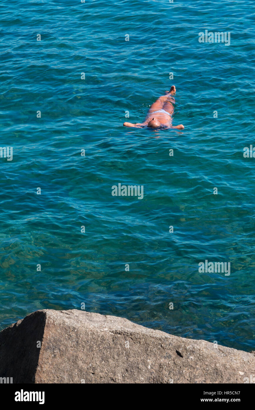 Float dead sea wetsuit hi-res stock photography and images - Alamy