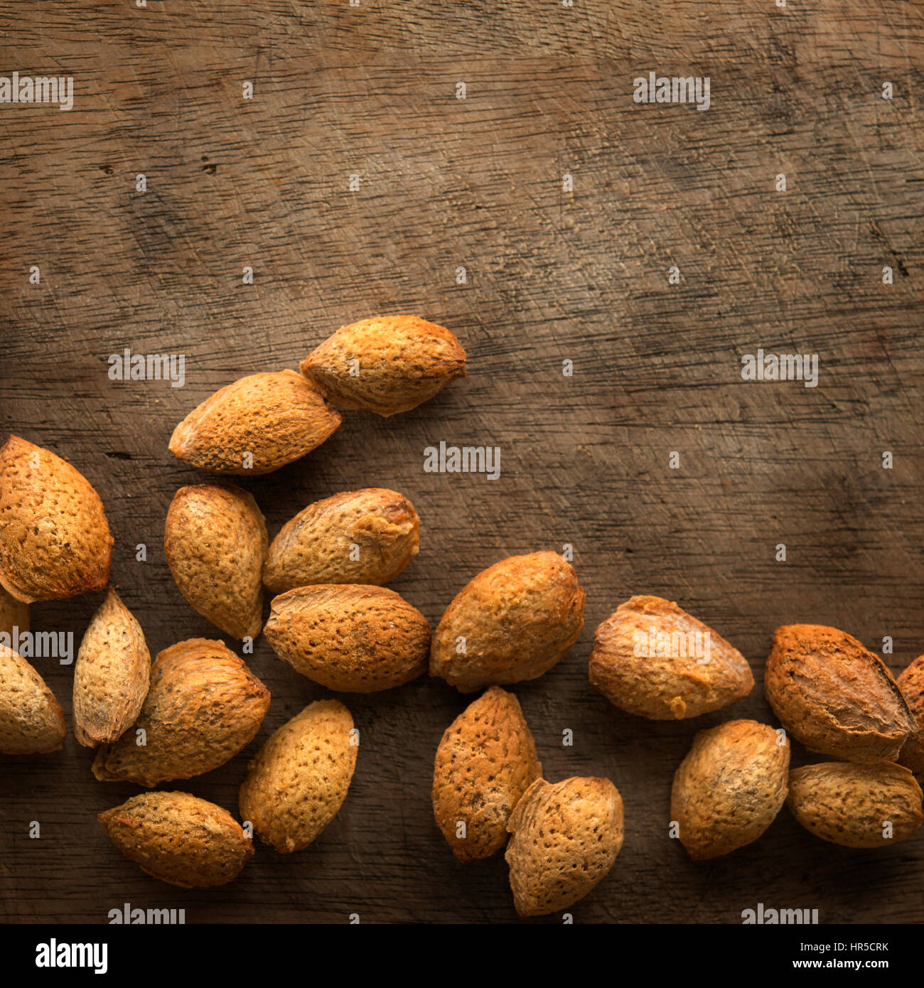 Top view almonds shell on rustic wood background with copy space Stock ...