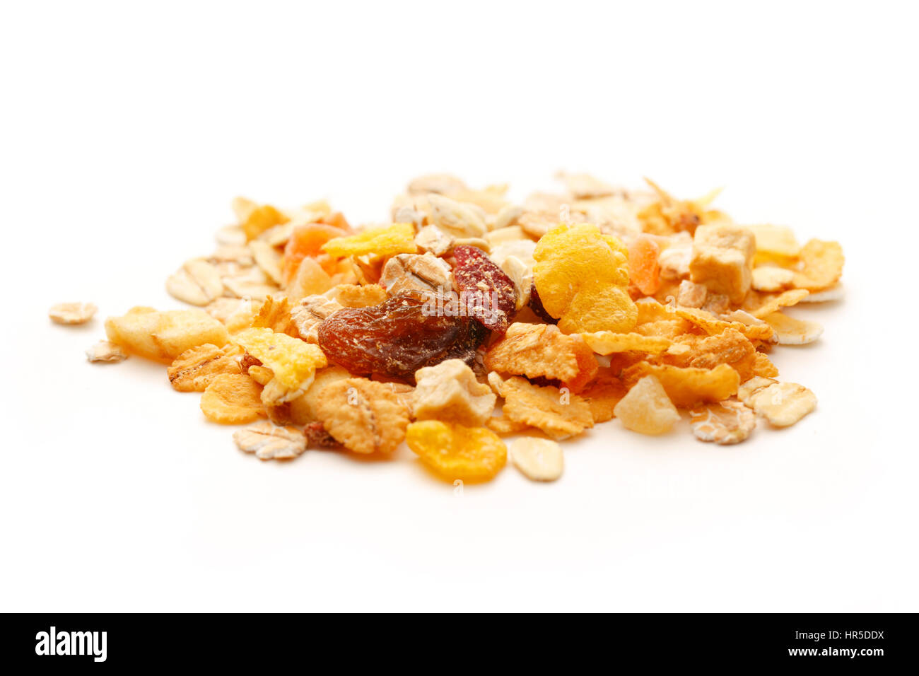 Heap of fresh musli with raisin on white background Stock Photo - Alamy