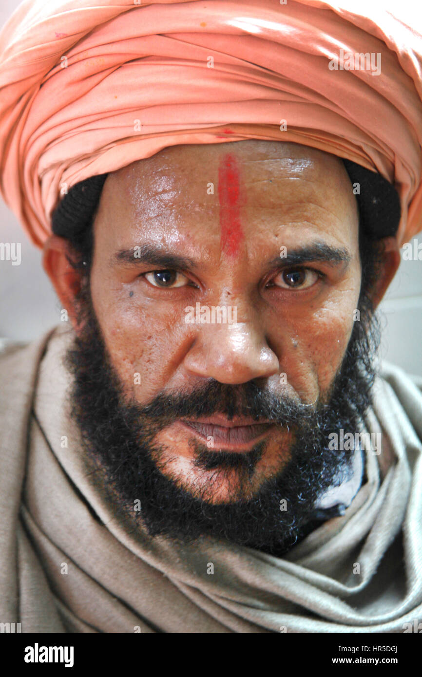 Senior indian man with orange turban hi-res stock photography and ...