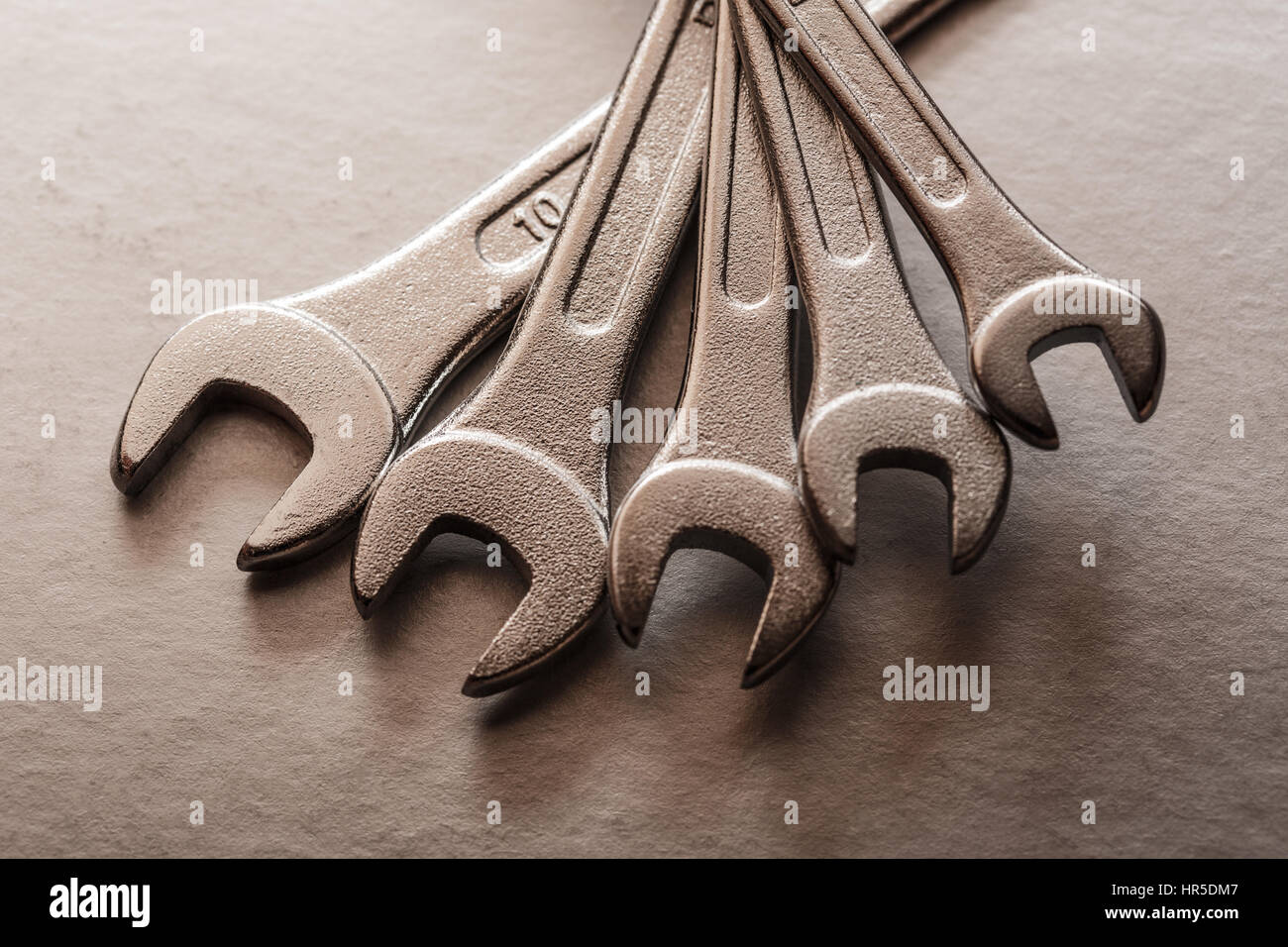 Set of new metallic spanners in closeup Stock Photo - Alamy