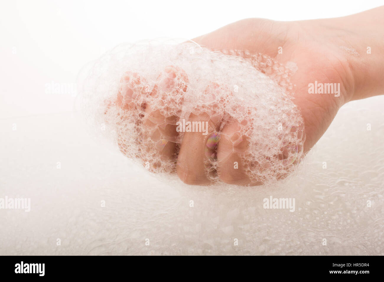 Hand washing and soap foam on a foamy background Stock Photo - Alamy