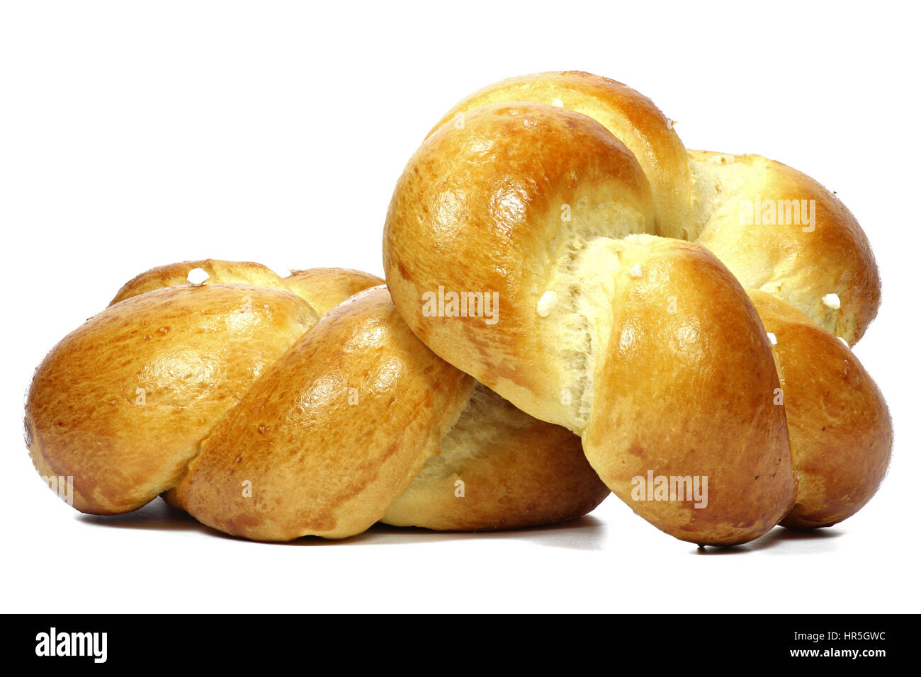 raised pastry crowns isolated on white background Stock Photo - Alamy