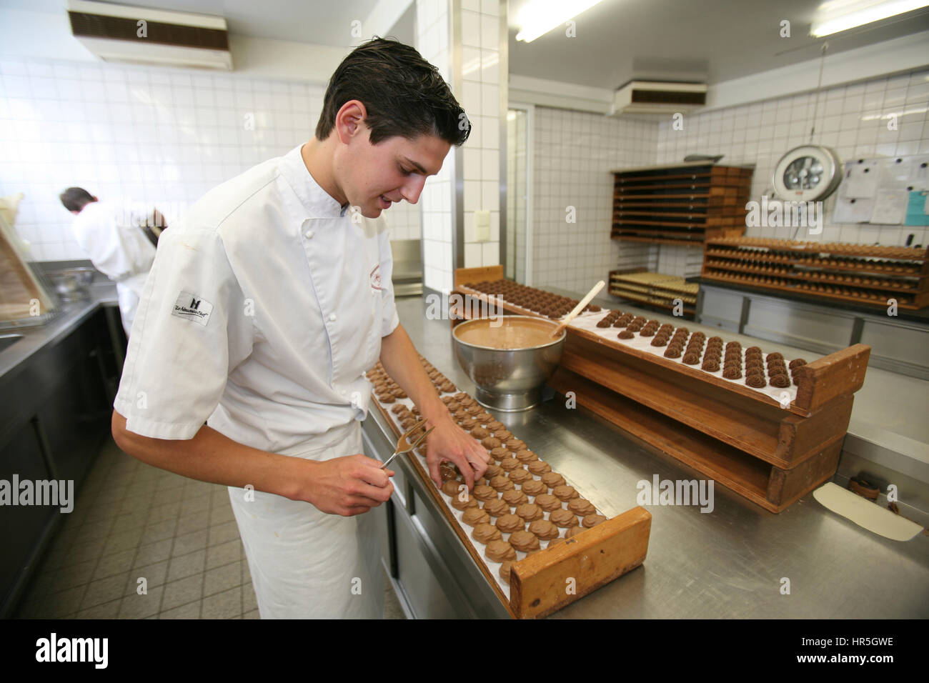 bonbonmaker at work Stock Photo - Alamy