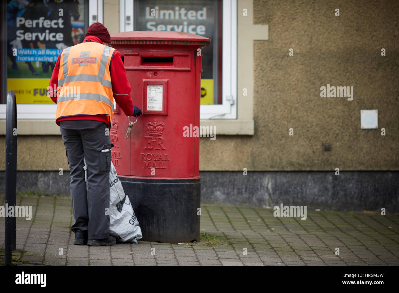 English postman uniform hi-res stock photography and images - Alamy