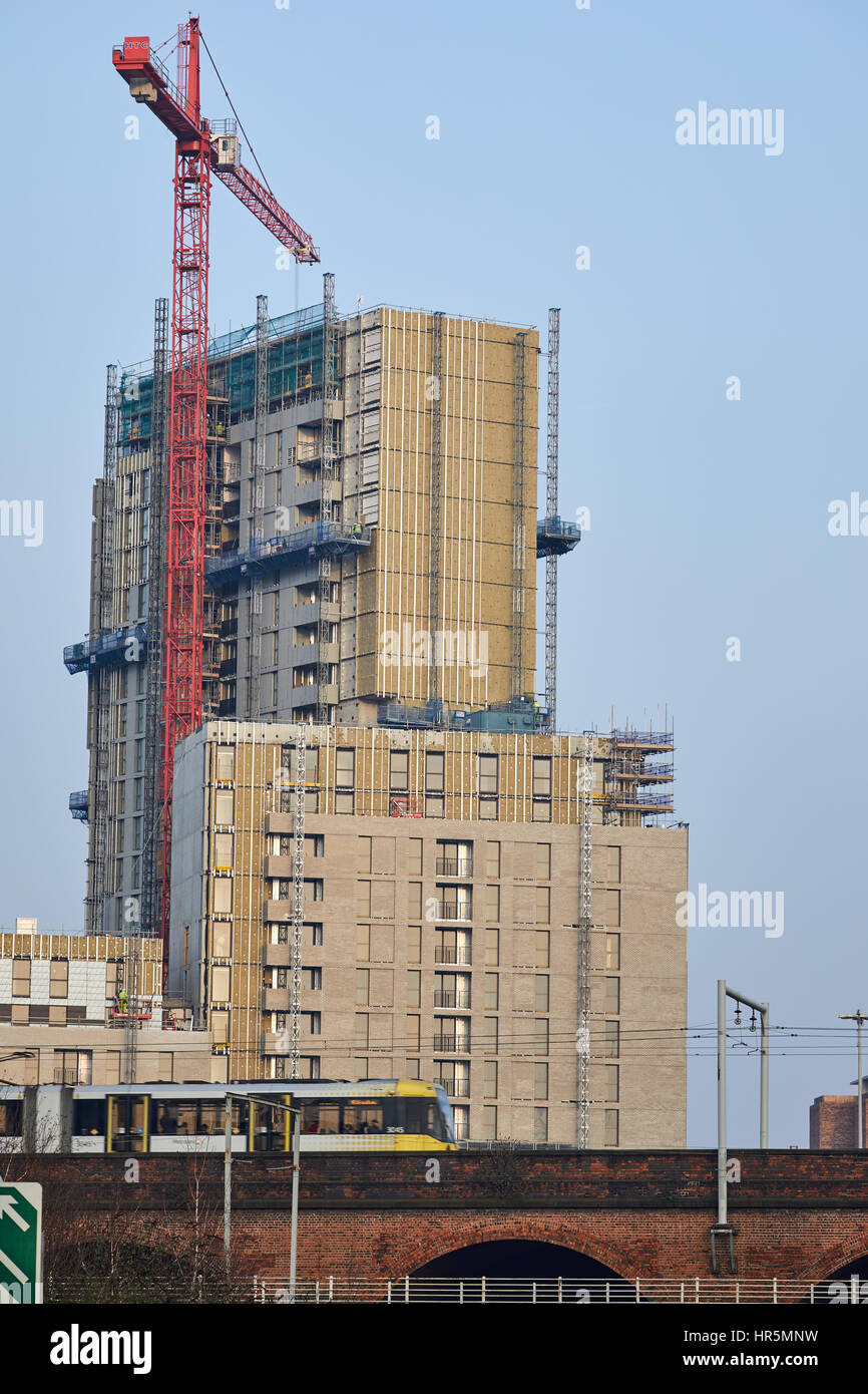 Blue sky sunny day tower cranes Castlefield Salford boundary Manchester ...