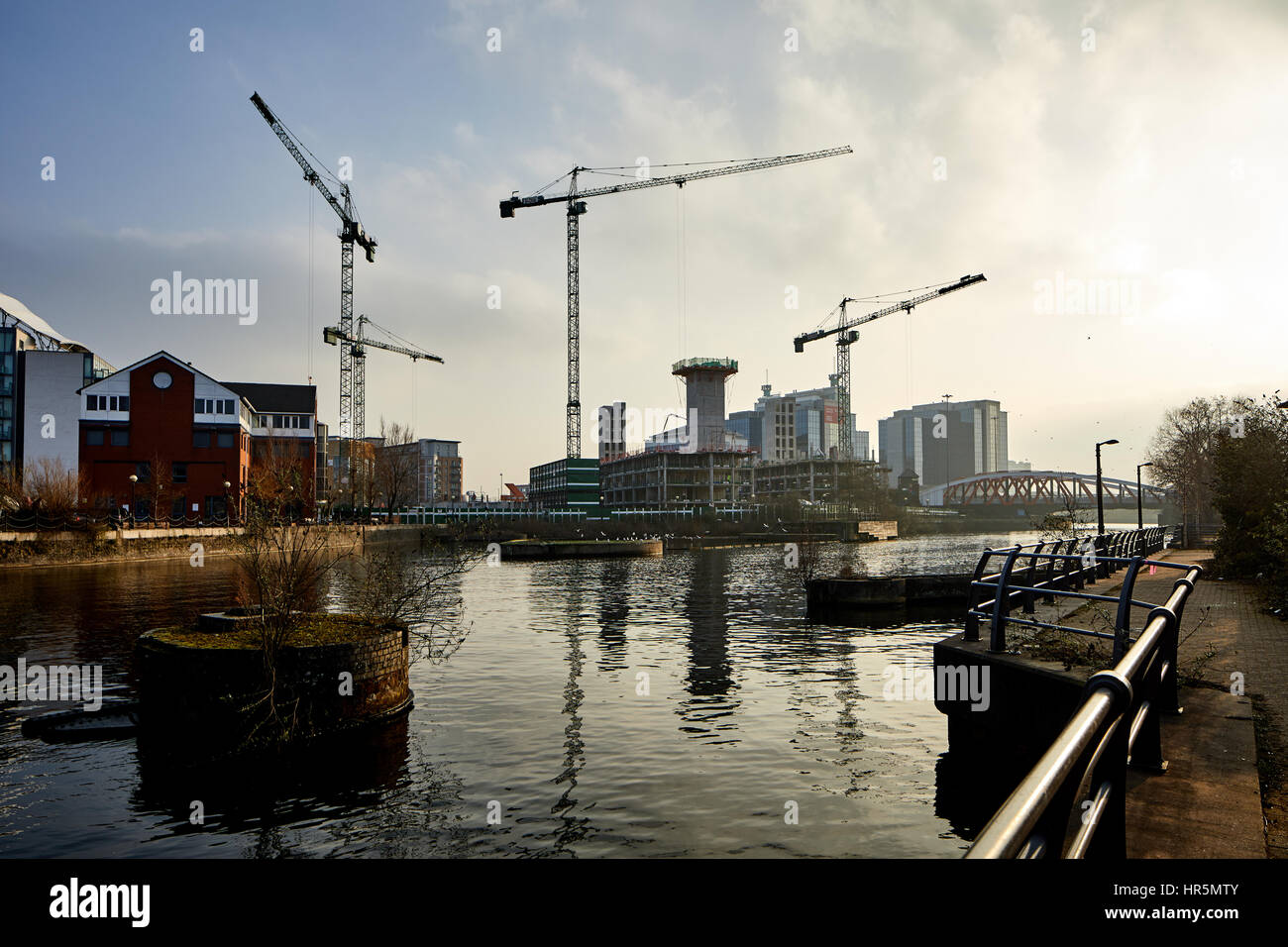 Regeneration work Manchester Docks, Crane towers on banks Manchester ...