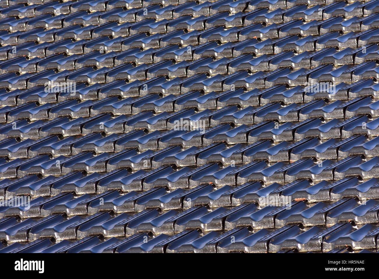 Pattern of shiny metallic roof tiles in rows Stock Photo - Alamy