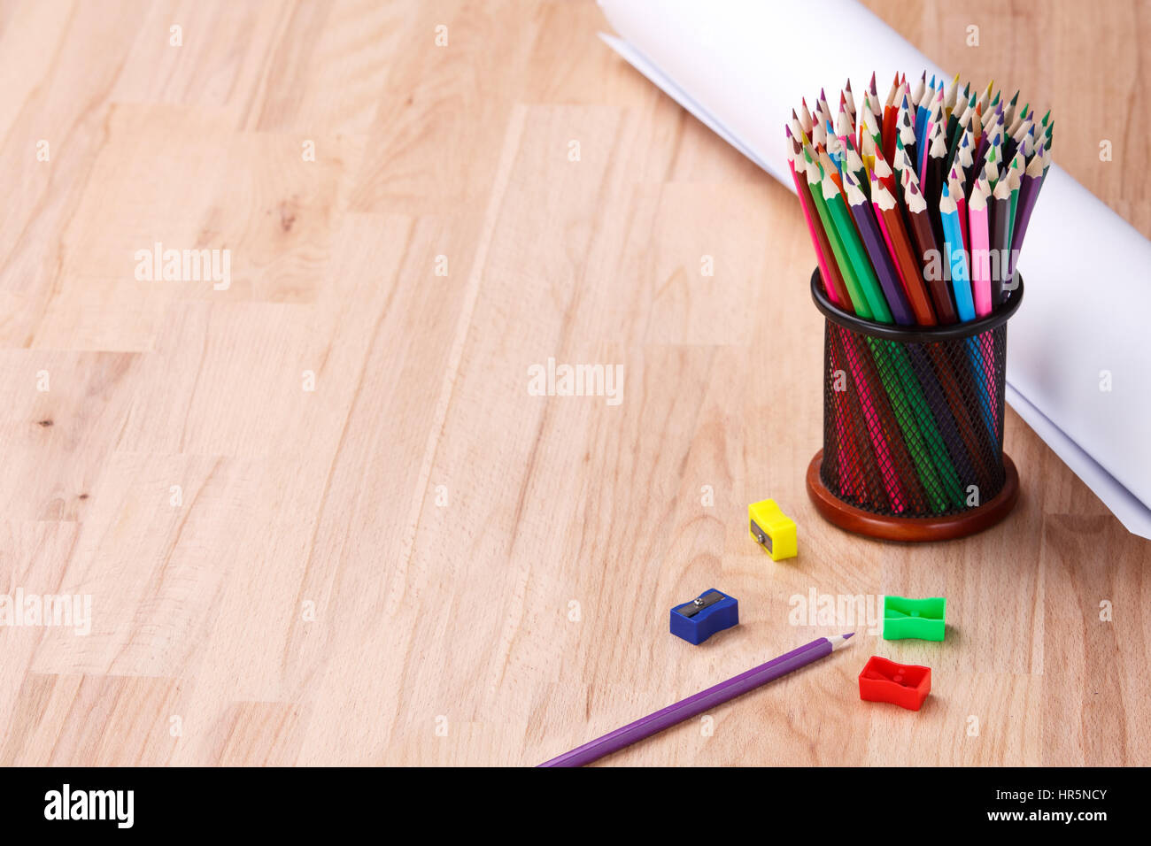 Stationery and paper on the table. Plank table with accessories to ...