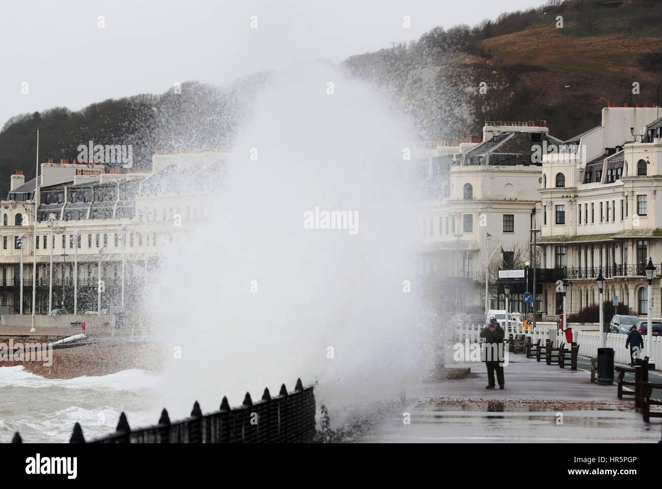 Waves crash over the promenade in Dover, Kent, as stormy weather ...
