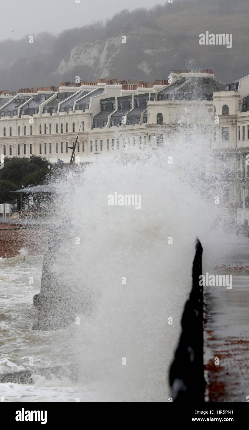 Waves crash over the promenade in Dover, Kent, as stormy weather ...