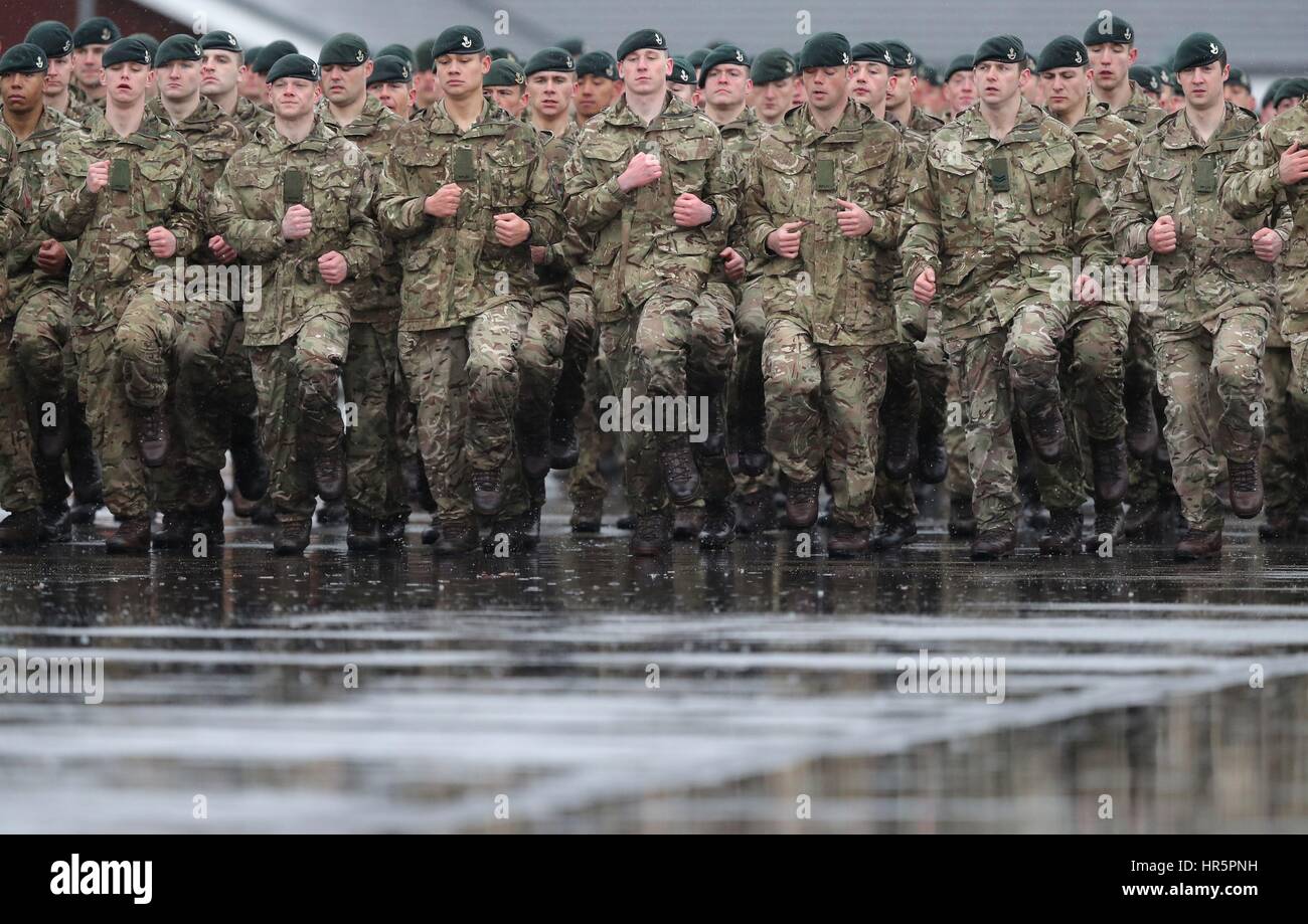 Members of 4th Battalion The Rifles march past The Duchess of Cornwall ...