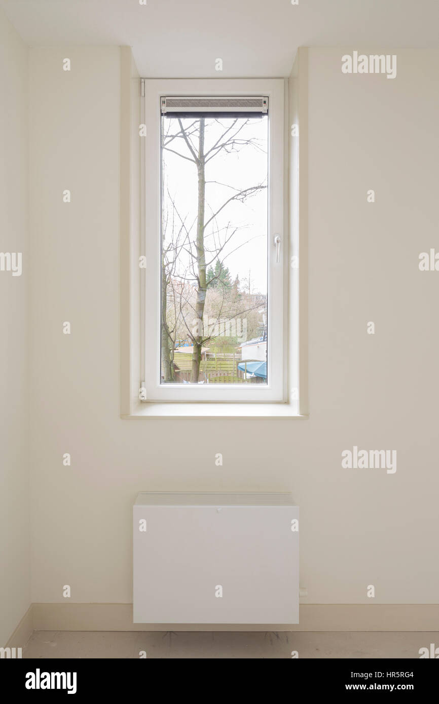 Window and radiator. Cillershoek housing, Rotterdam, Netherlands ...