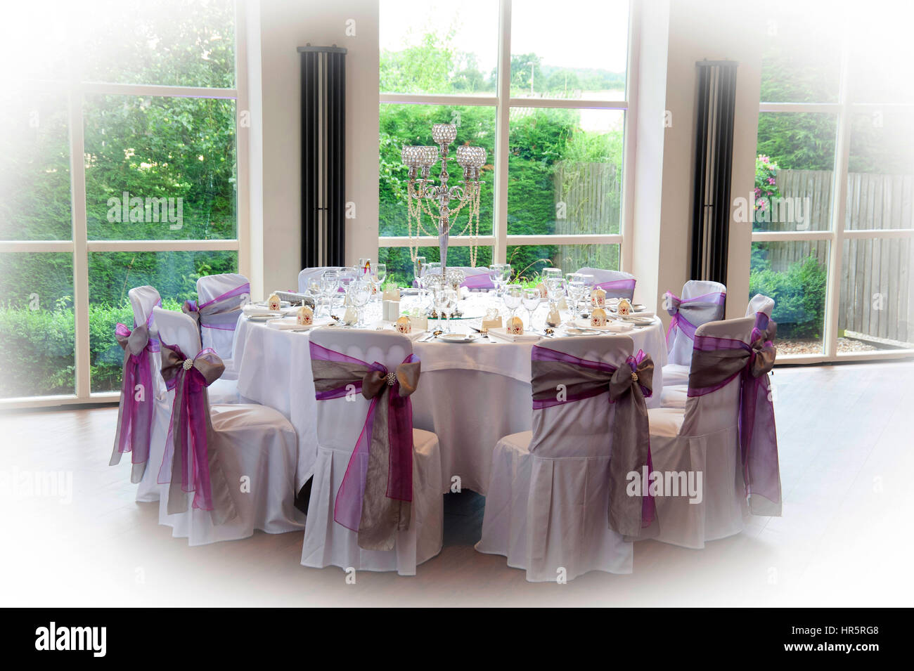 Table laid for wedding reception Stock Photo - Alamy