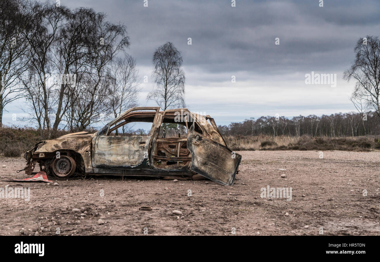 Burnt out car wreck Stock Photo - Alamy
