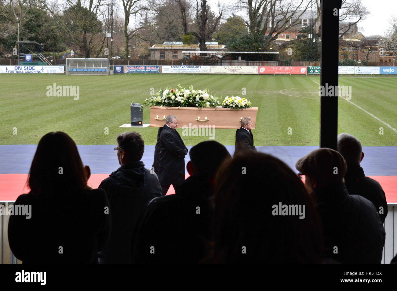 The coffin of Alan Simpson is carried at his funeral, held at Hampton ...