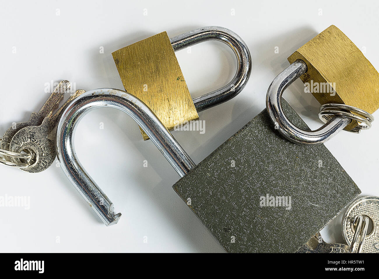 Locks on white background for safety Stock Photo - Alamy