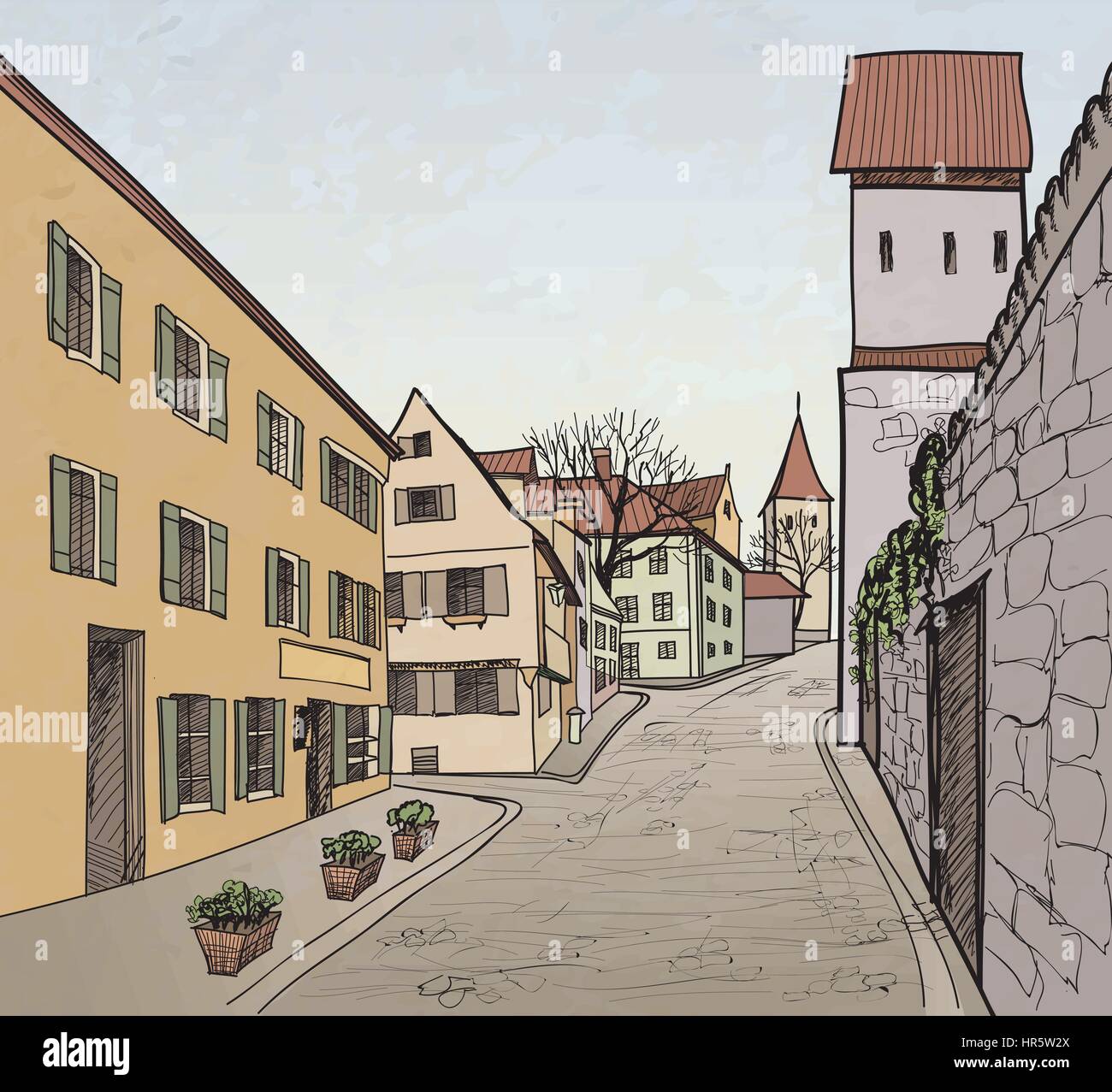 Pedestrian street in the old european city with tower on the background ...