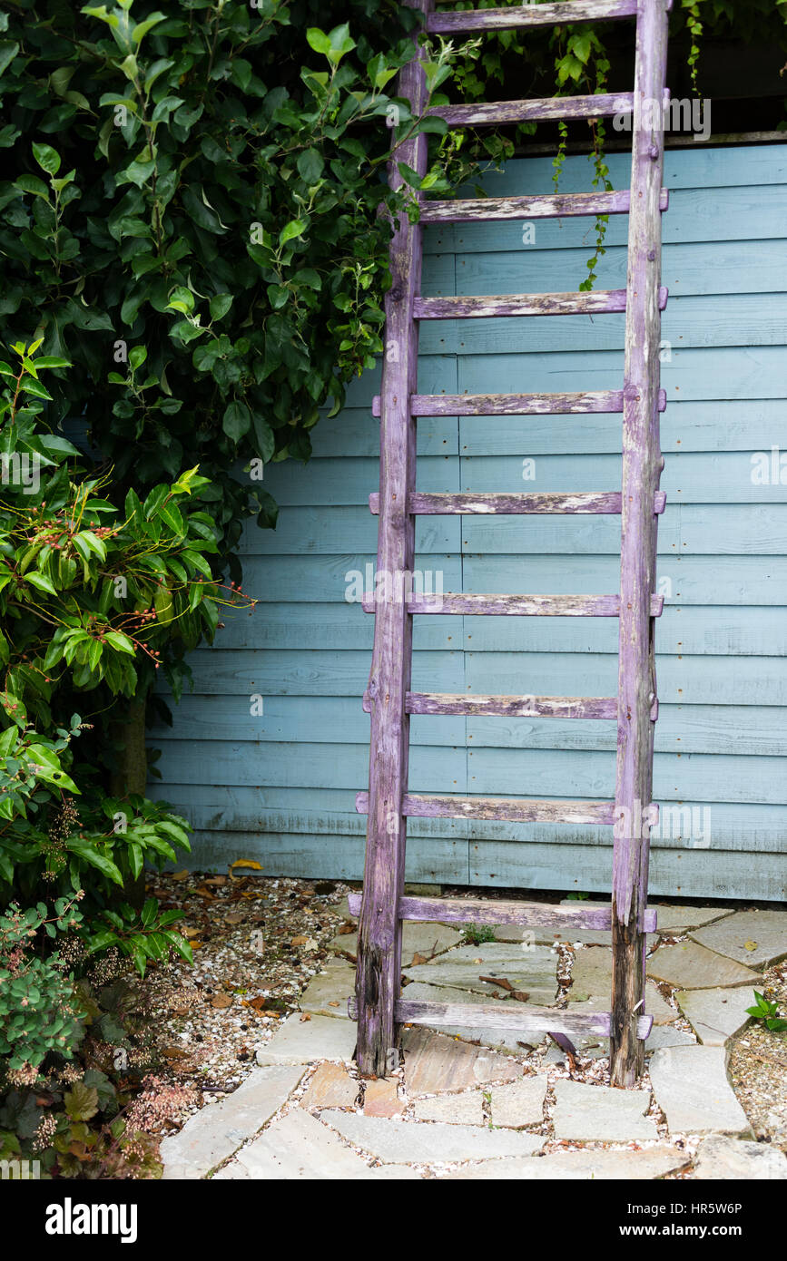 old vintage ladder for climbing up high Stock Photo - Alamy