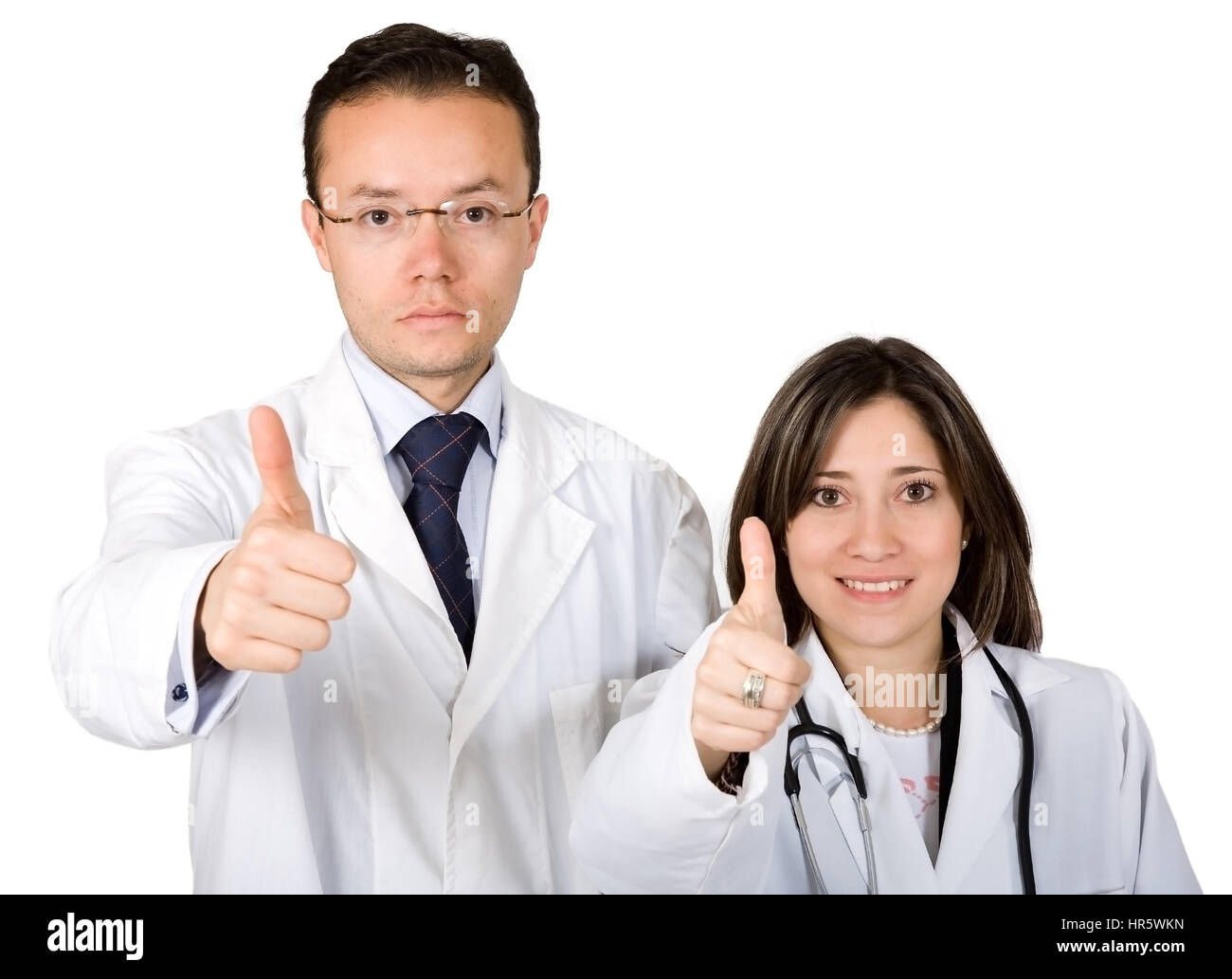 couple of doctors with a positive attitude - thumbs up over a white ...