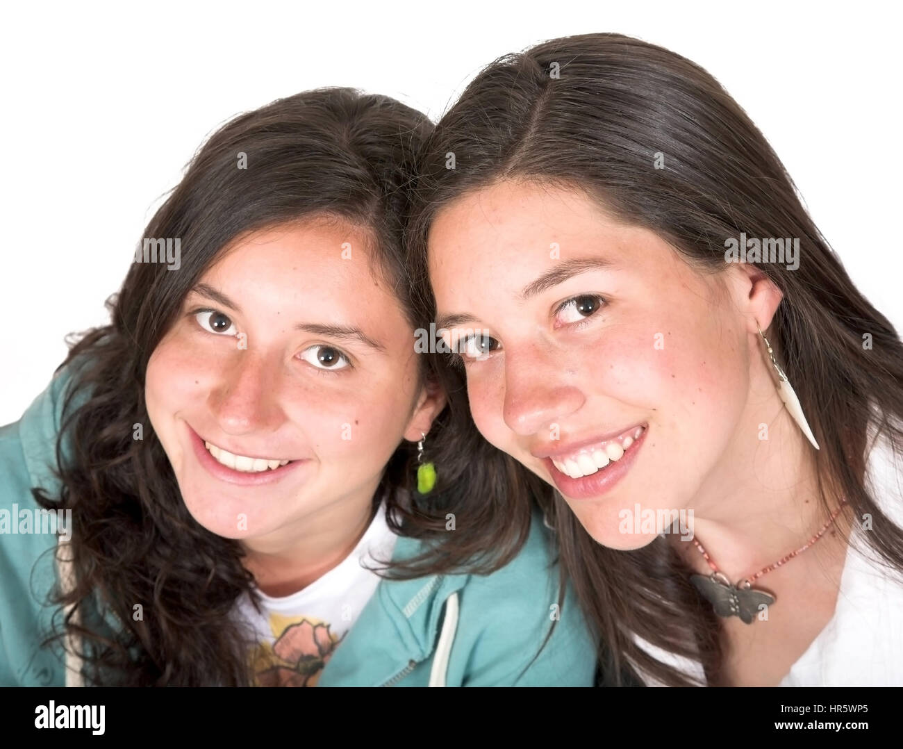 beautiful sisters portrait over white Stock Photo - Alamy