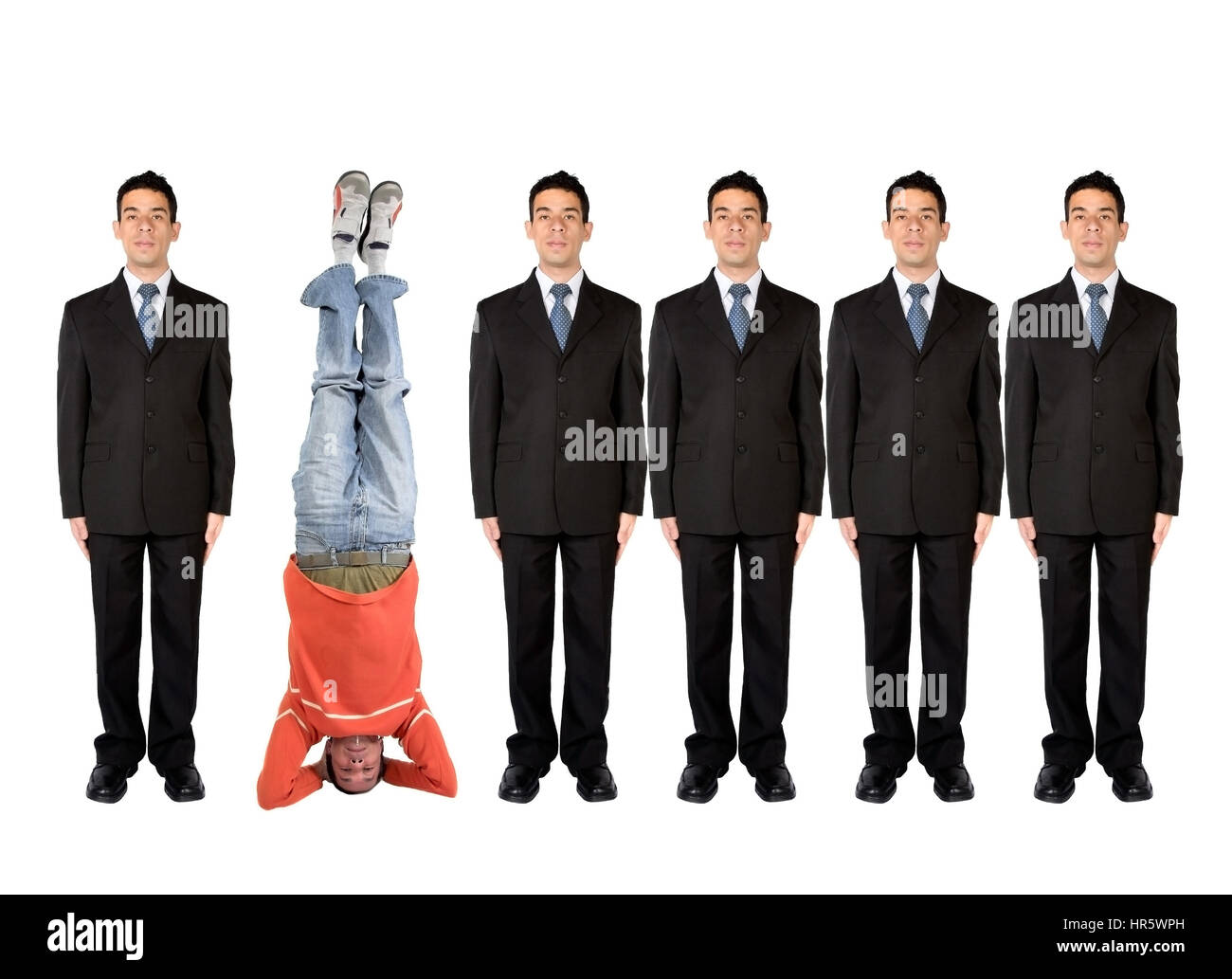 business people in a series with a casual guy doing the headstand Stock ...