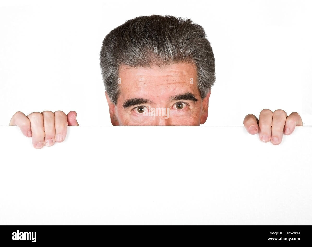 senior business man peeping over - white background Stock Photo - Alamy