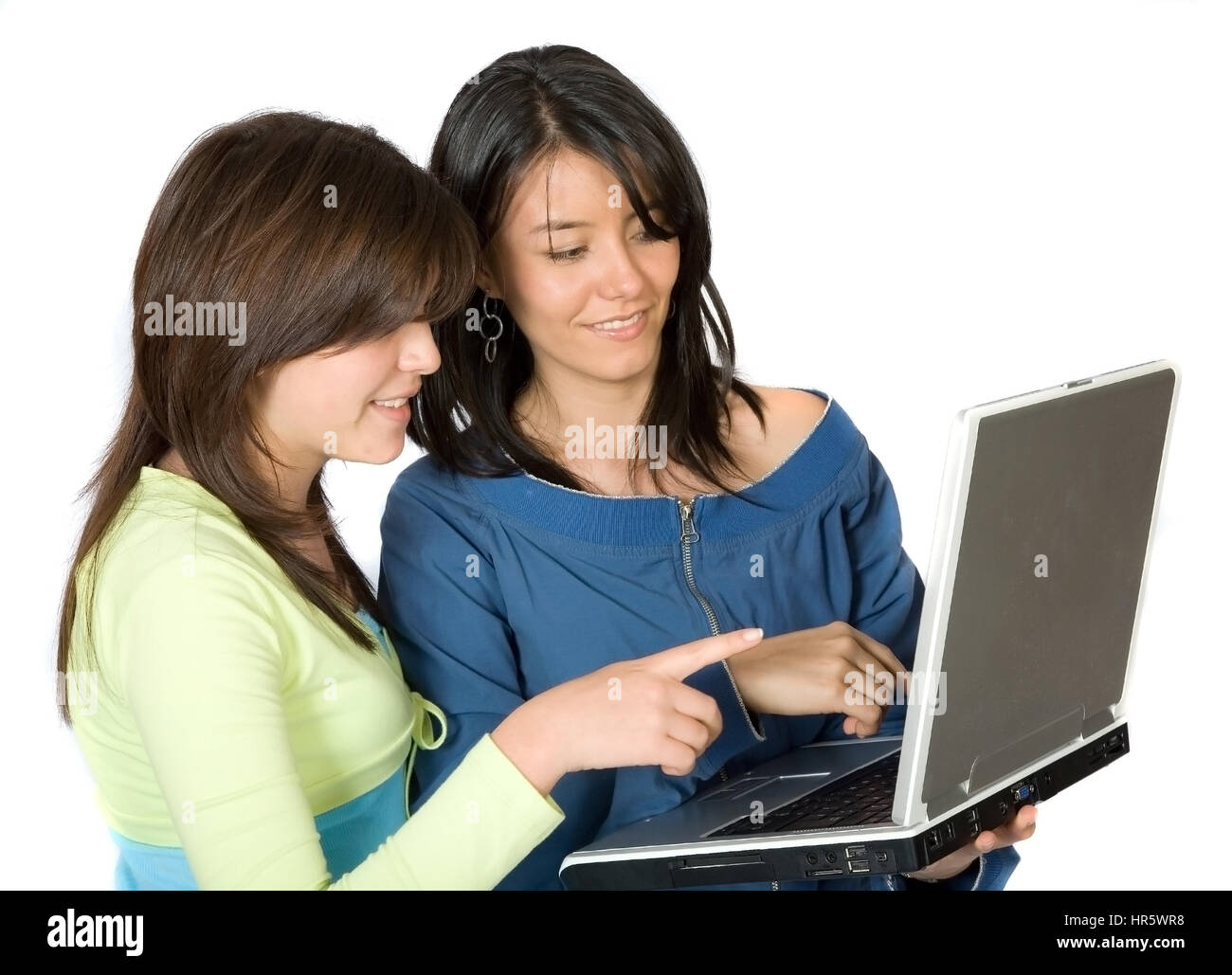 girls on a laptop over a white background Stock Photo - Alamy