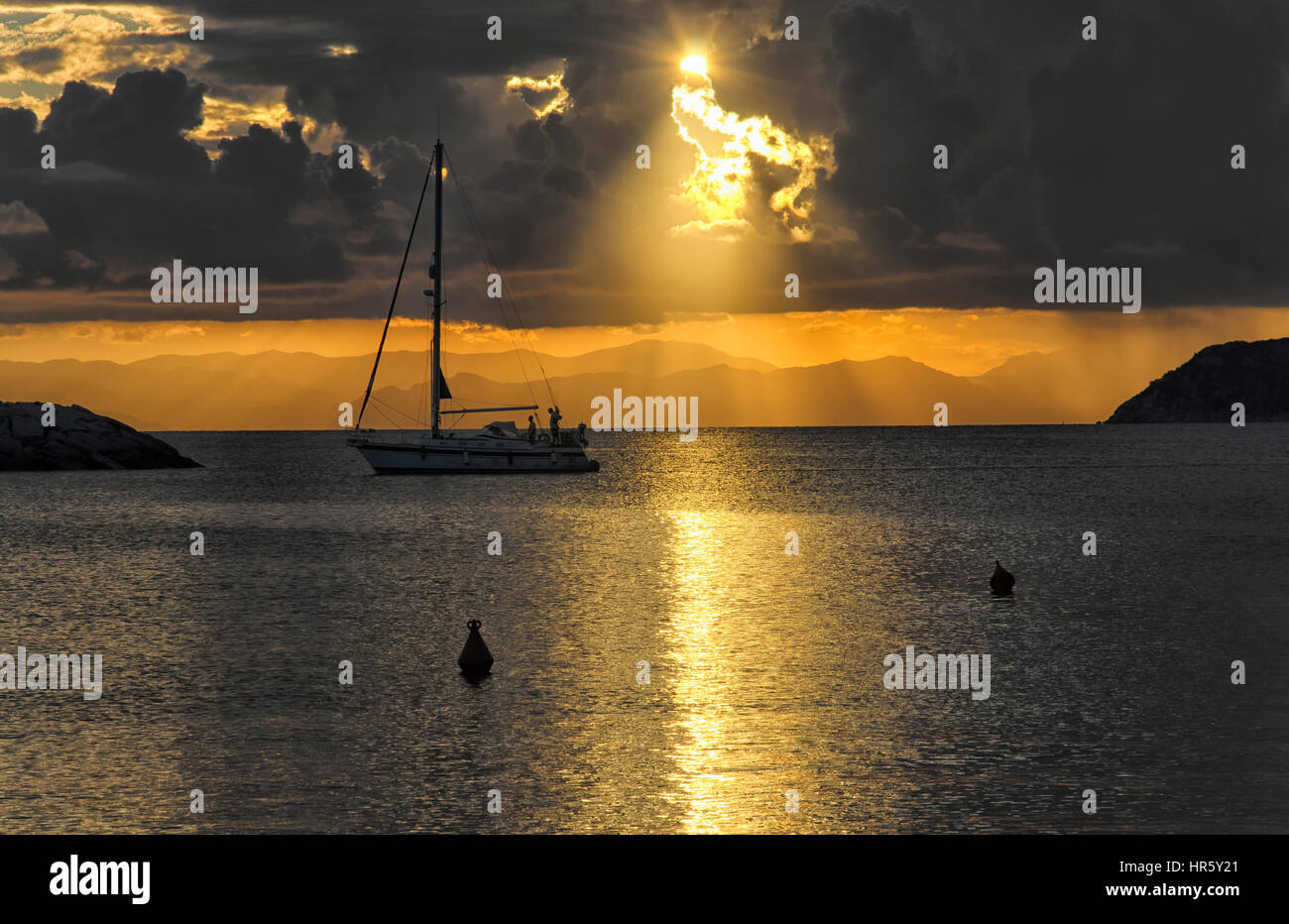 View of sailing boat at the sunset Stock Photo - Alamy