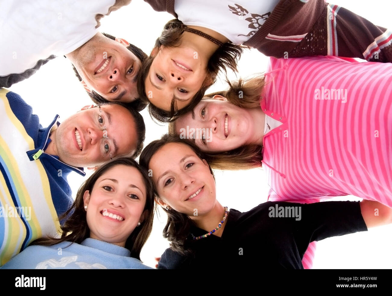 happy friends together in bright and colourful colors over white ...