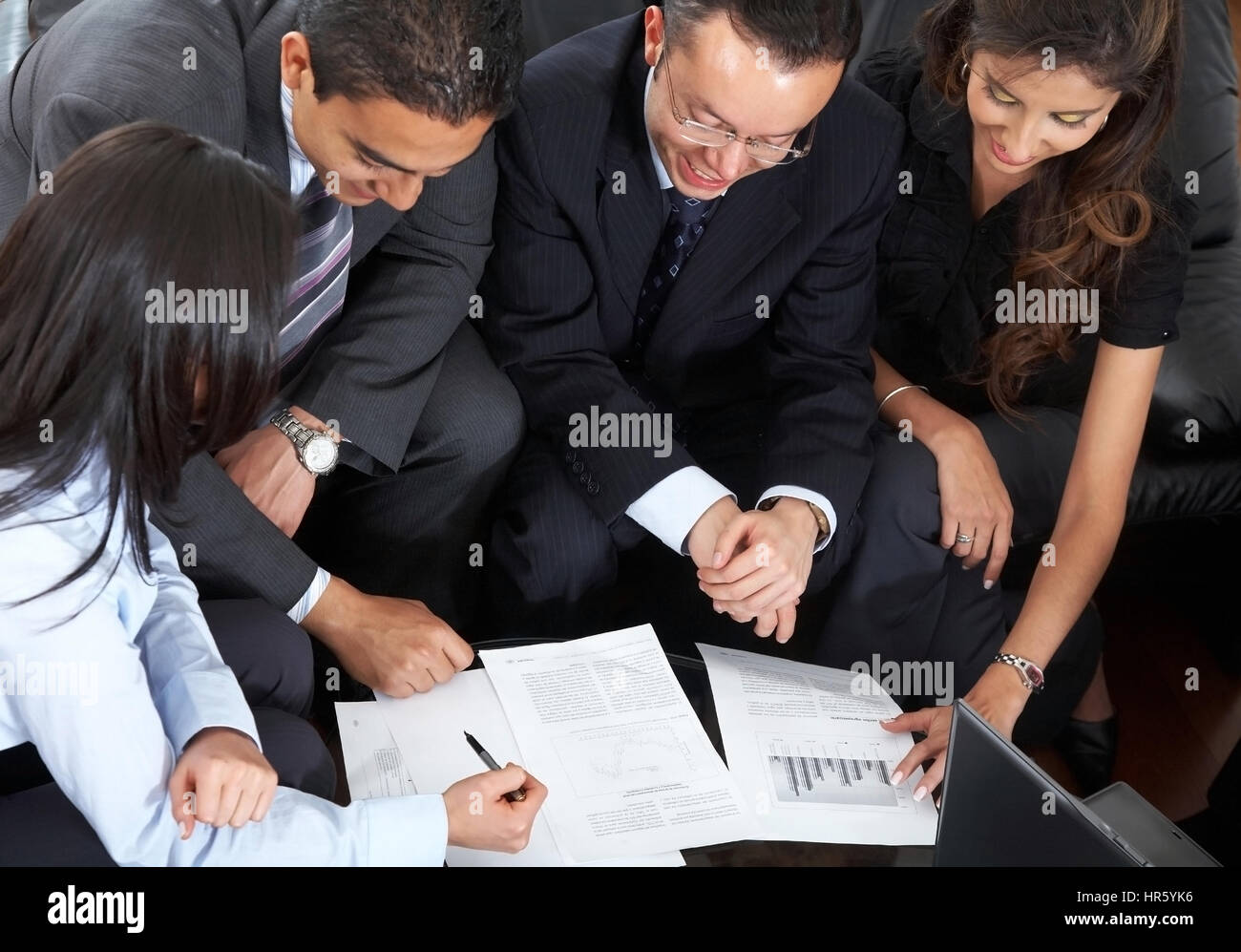 business team having a meeting in an office Stock Photo - Alamy