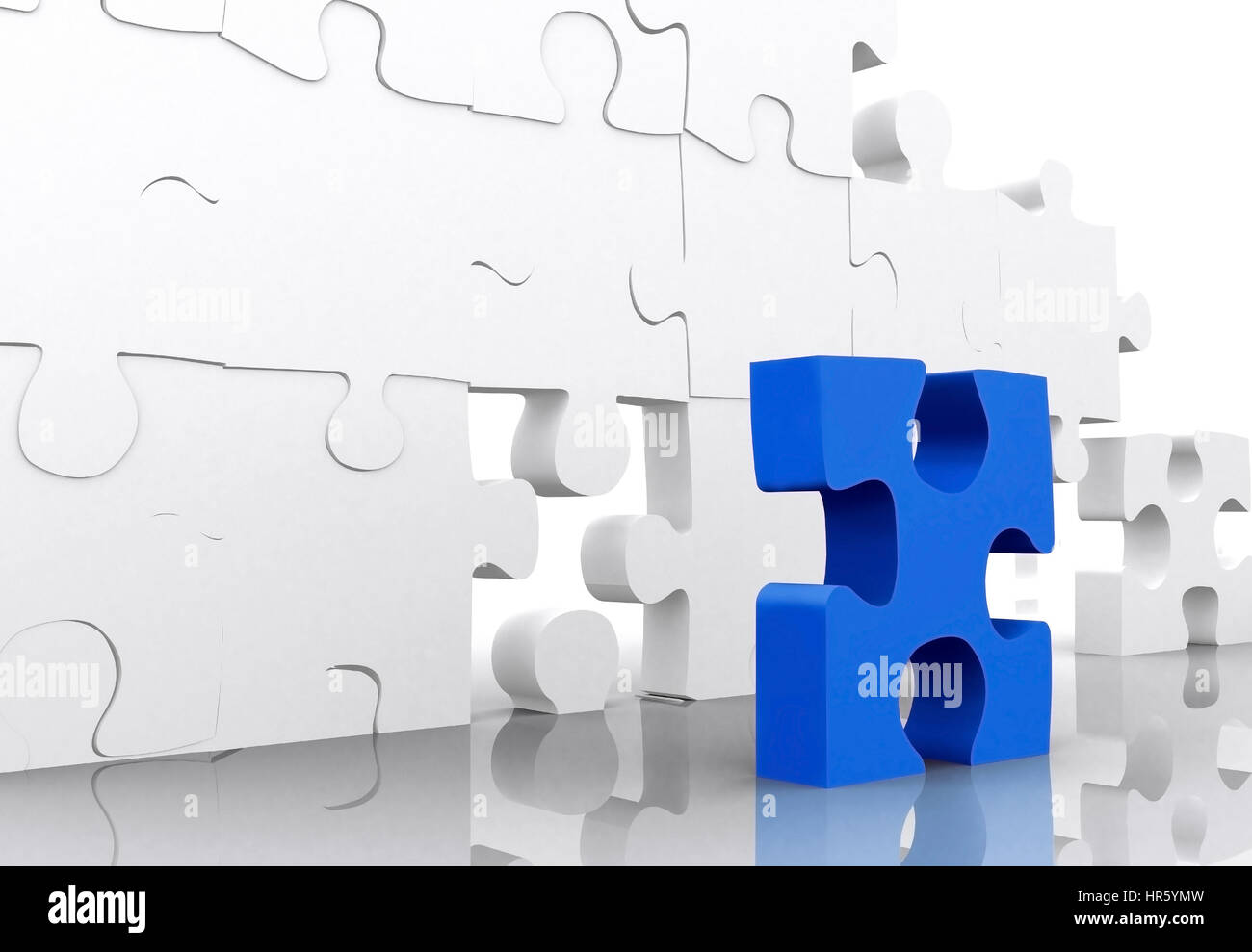 blue puzzle piece in front of a big jigsaw-puzzle Stock Photo - Alamy