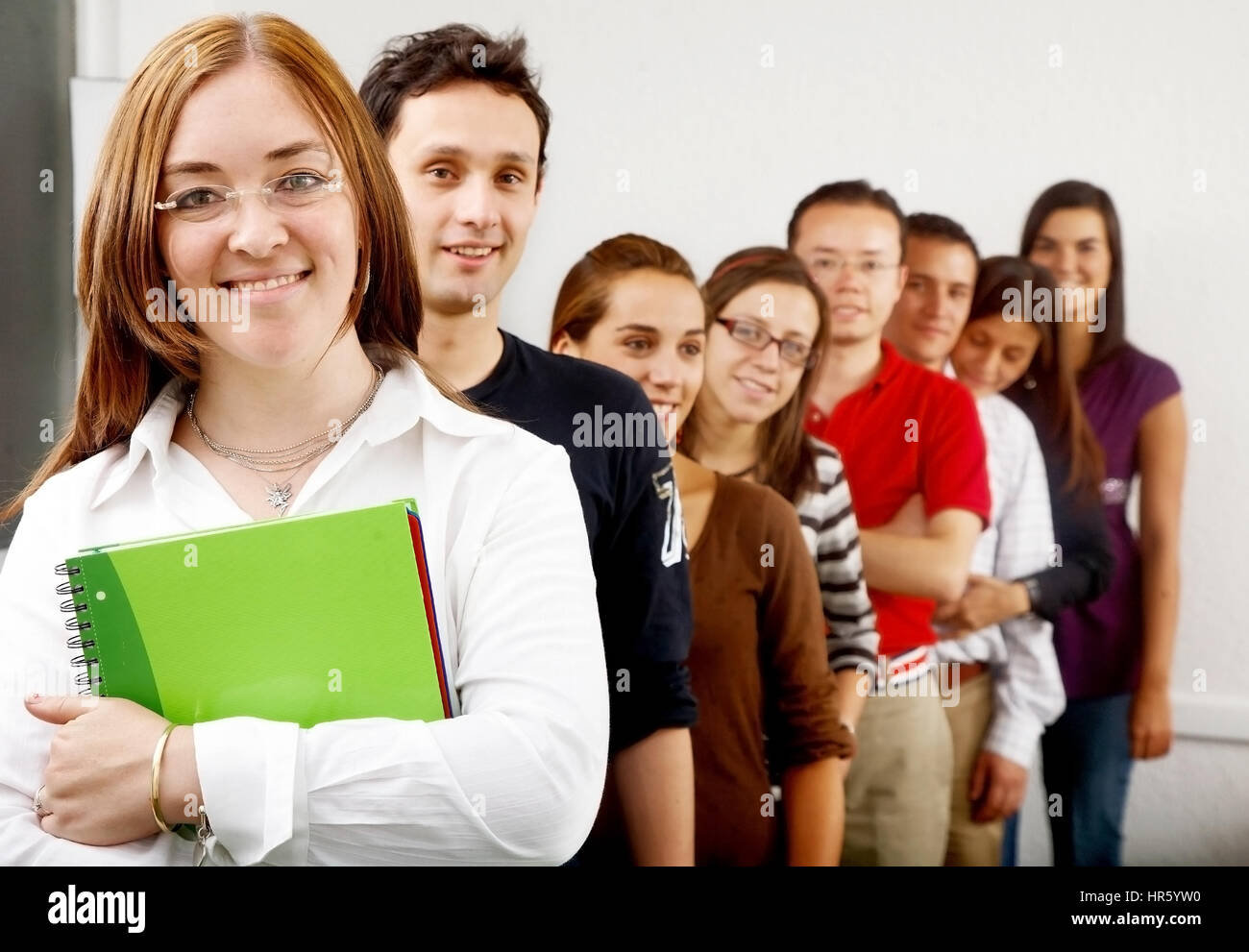 casual group of students lead by a teacher Stock Photo - Alamy