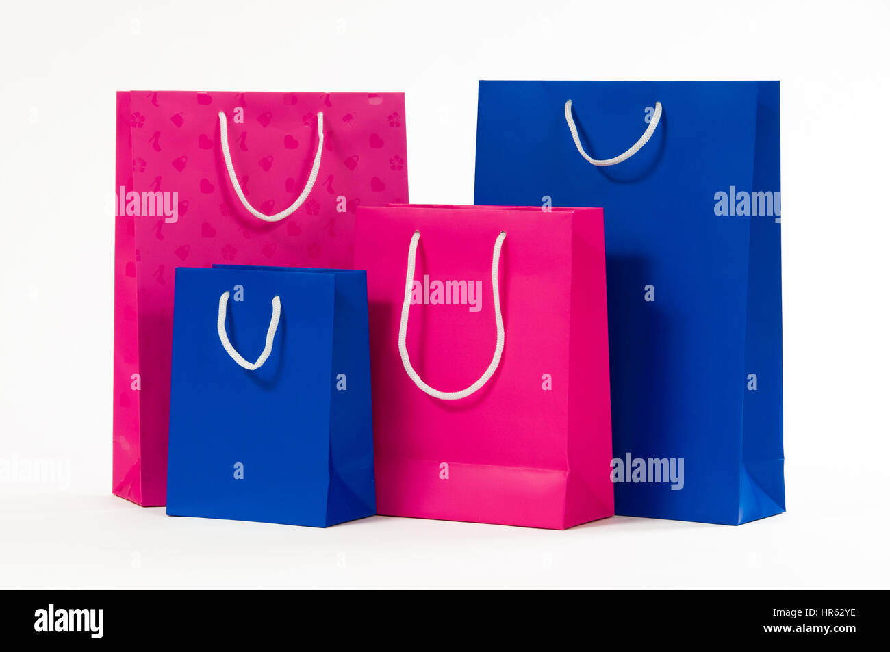 Pink and blue paper bag isolated on white background Stock Photo - Alamy