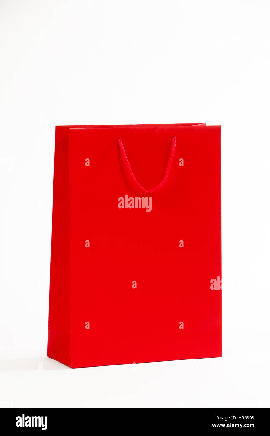 Red paper bag on a white background Stock Photo - Alamy