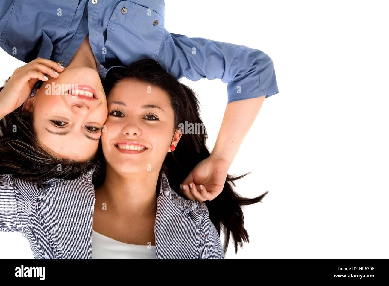 beautiful sisters smiling isolated over a white background Stock Photo ...