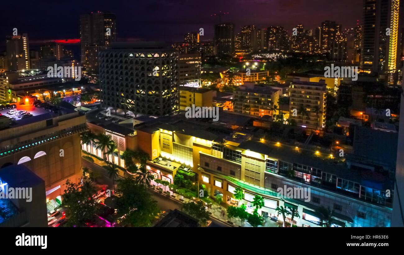 Colorful night life lights of Waikiki city from top overlook. Oahu ...
