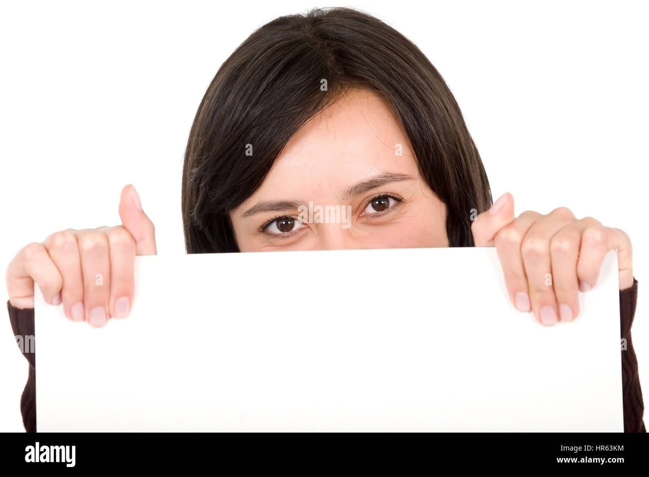 girl displaying a white card isolated over a white background Stock ...