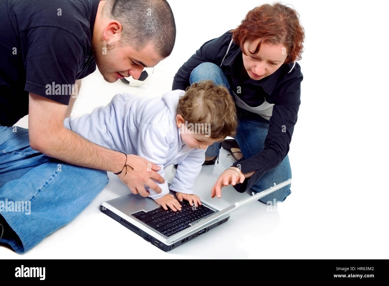 family on a laptop computer isolated over a white background Stock ...