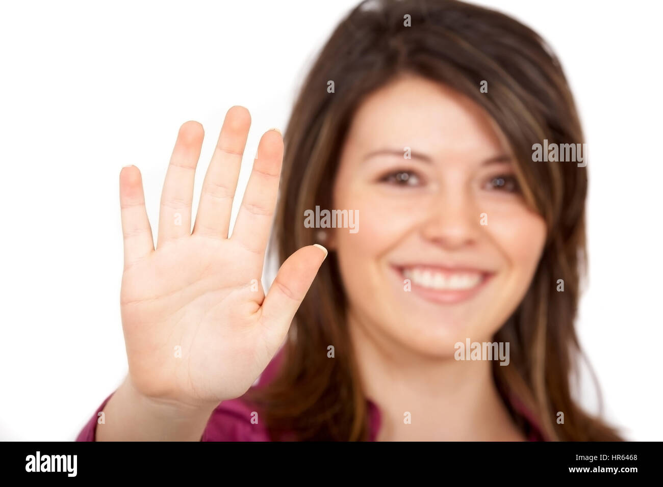 girl showing her hand isolated over a white background Stock Photo - Alamy